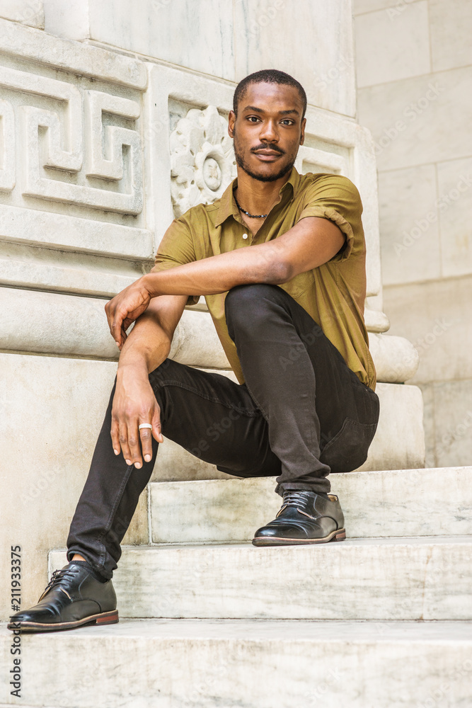 Young African American Male College Student with beard, wearing green ...