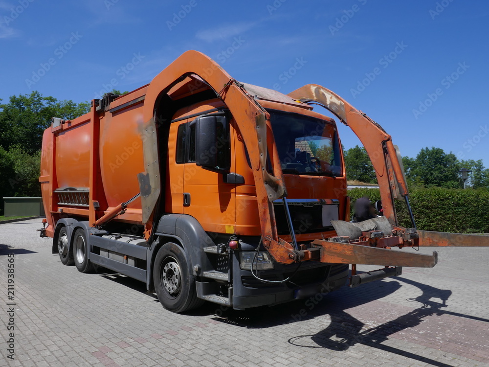 Recycling vehicle at work Recycling vehicle, truck, a heavy commercial ...