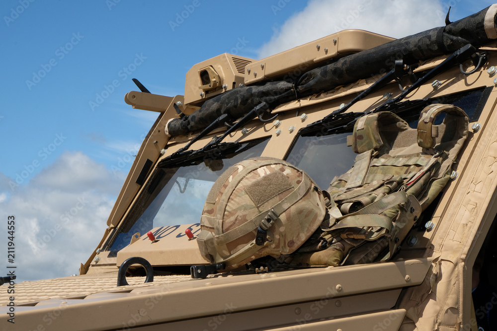 Cabin of RAF military vehicle with regiment soldiers helmet. Stock ...
