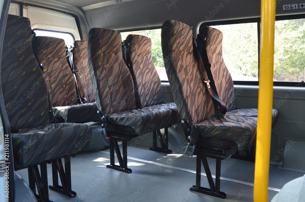 Seats in the cabin of the minibus. Stock Photo | Adobe Stock
