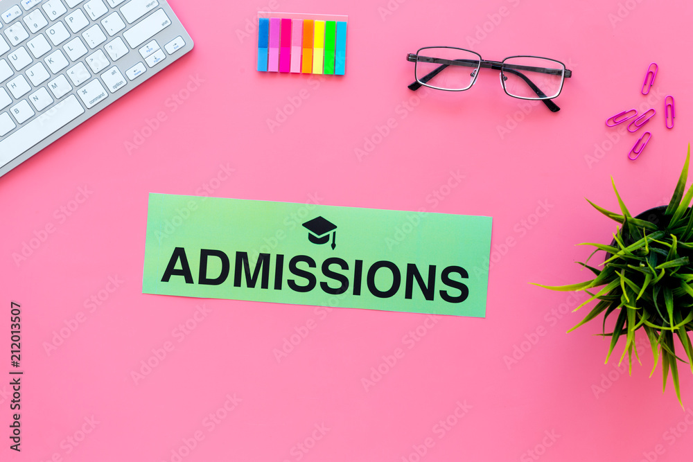 College admission concept. Word admissions with graduation cap sign on ...