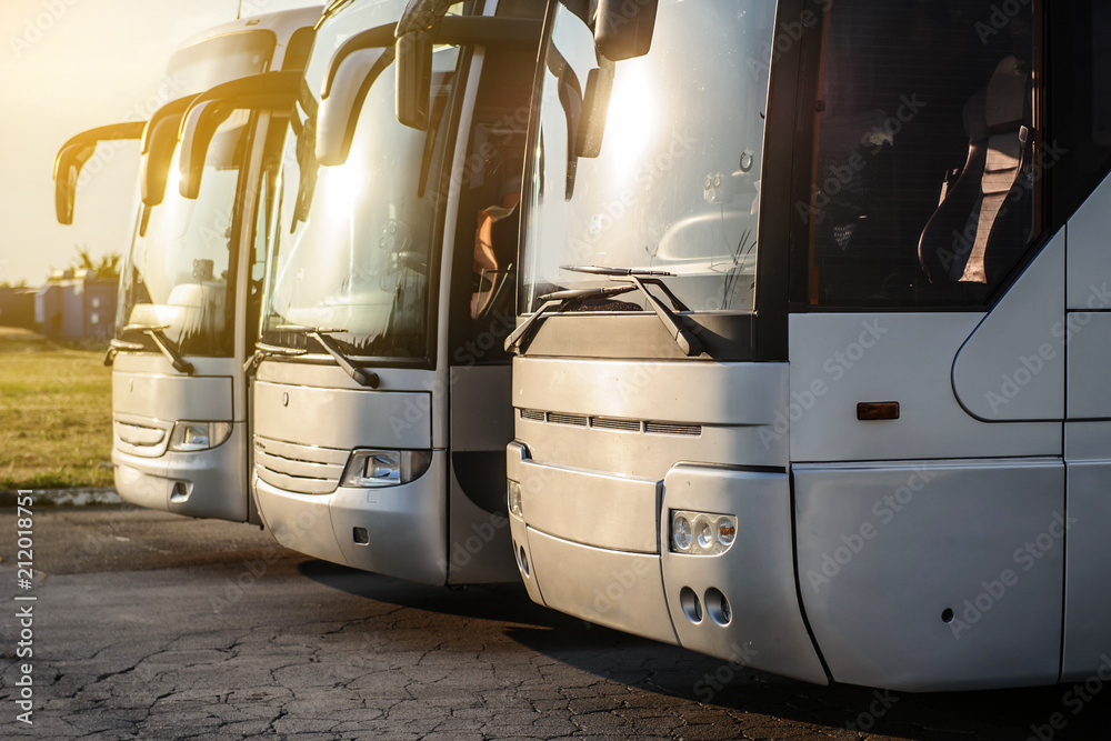 three metallic buses in the parking Stock Photo | Adobe Stock