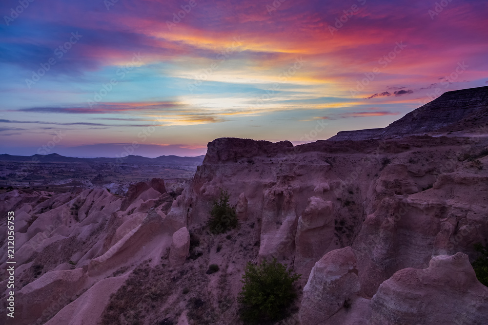 Unreal landscape of Cappadocia. Colorful sunset in valley. G reme ...