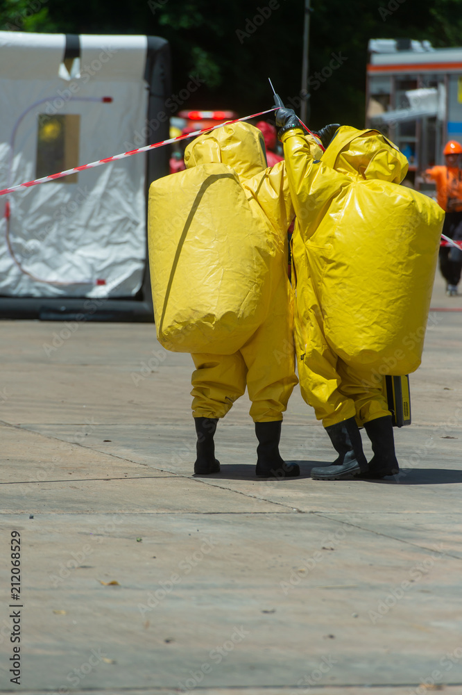 Fireman and hazmat (hazardous material) suits in hot zone tent Stock ...