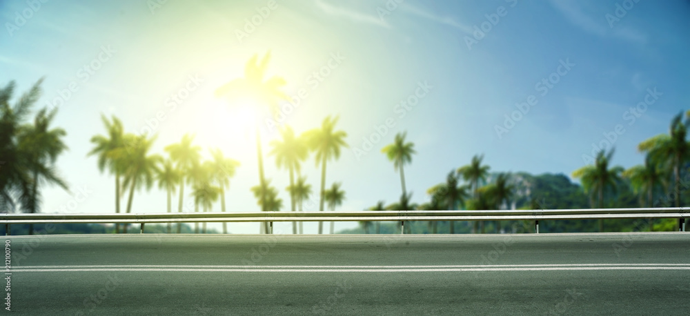 Summer background of road with palms and sunset time Stock Photo ...
