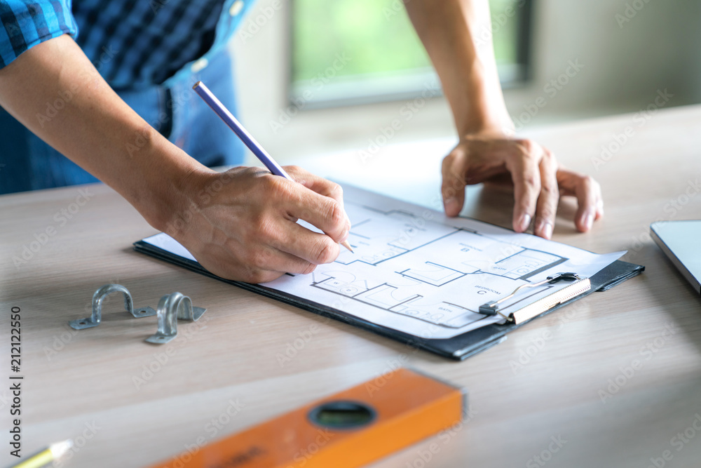 Foto de Architect & Engineer working drawing document about project ...