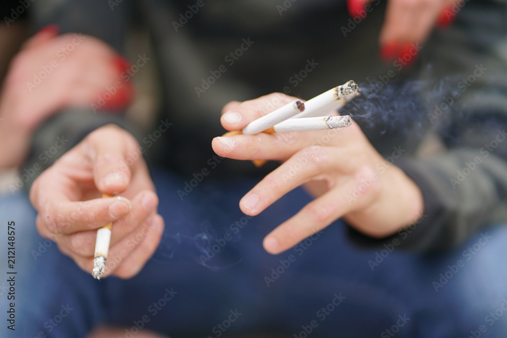 hands with wounds and sores hold a lot of cigarettes close - up Stock ...