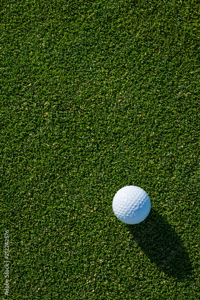 Early morning on the golf green, still covered in dew and sparkles from ...