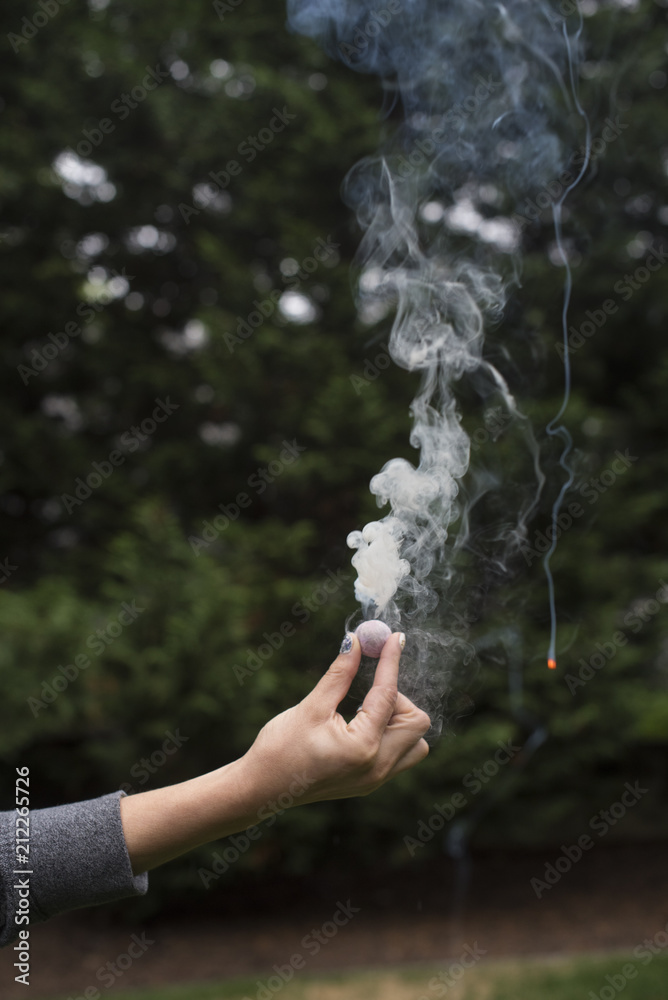 Hand holding firecracker Stock Photo | Adobe Stock