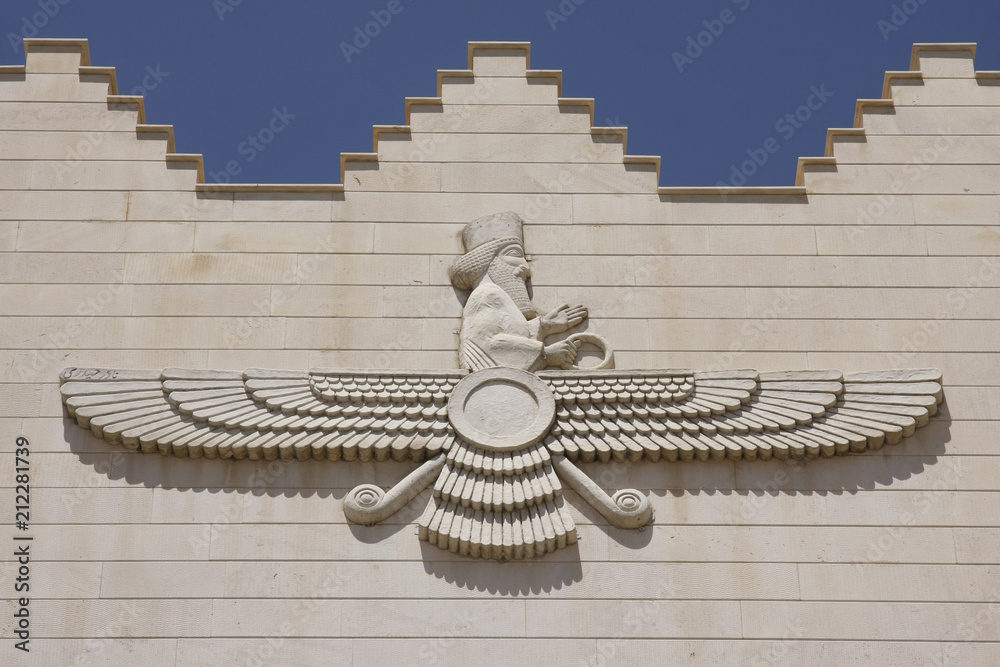 Faravahar symbol on a facade of the building in Kermanshah, Iran Stock ...