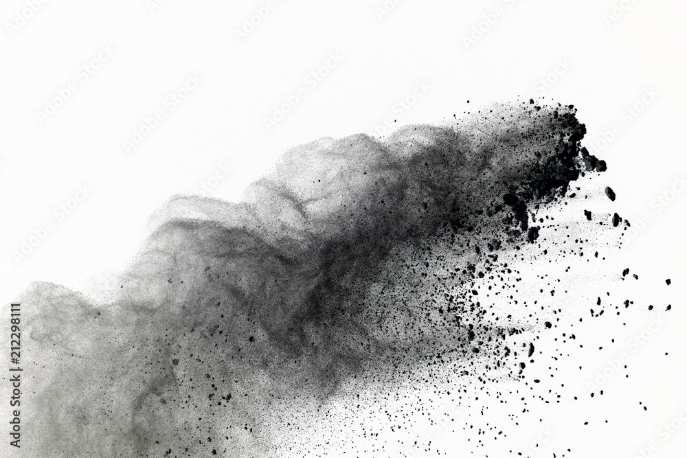 Black powder explosion against white background. Black dust explosion ...
