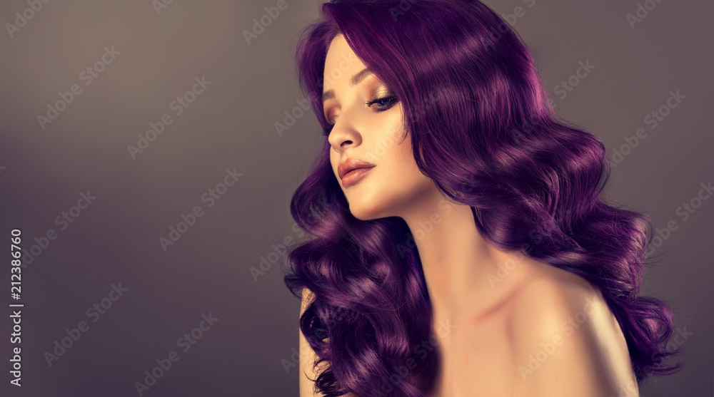 Beautiful model girl with long purple curly hair . Care products ,hair ...