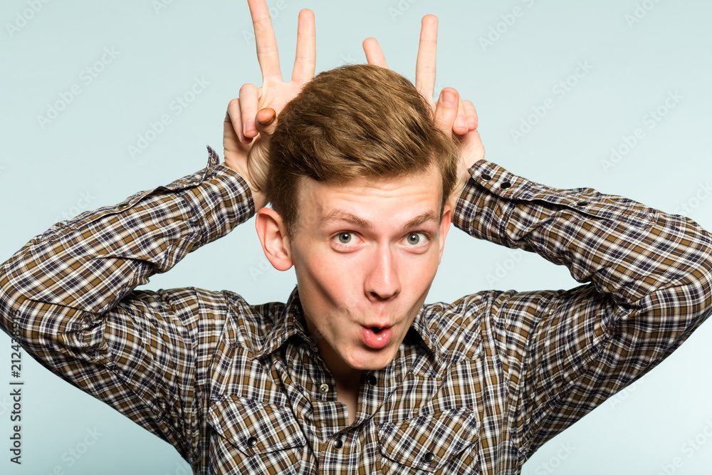 funny ludicrous amusing comic playful man fooling around giving bunny ...