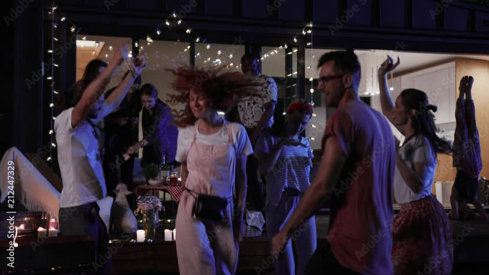 Large group of friends dancing and celebrating a party. Dancing ...