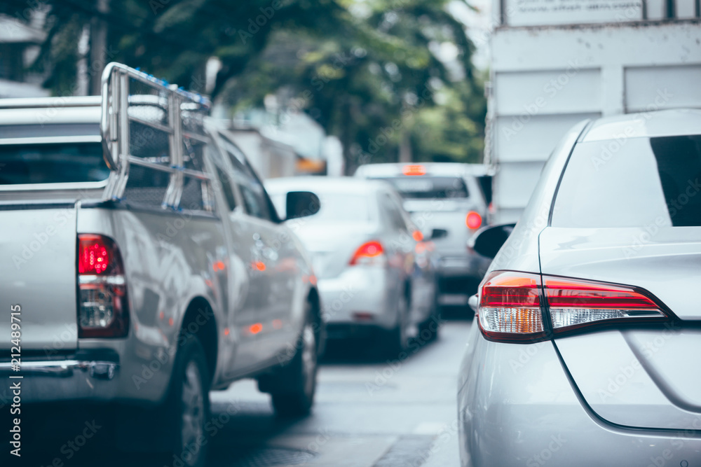 Traffic jam in crowded urban city on street lane - air pollution and ...