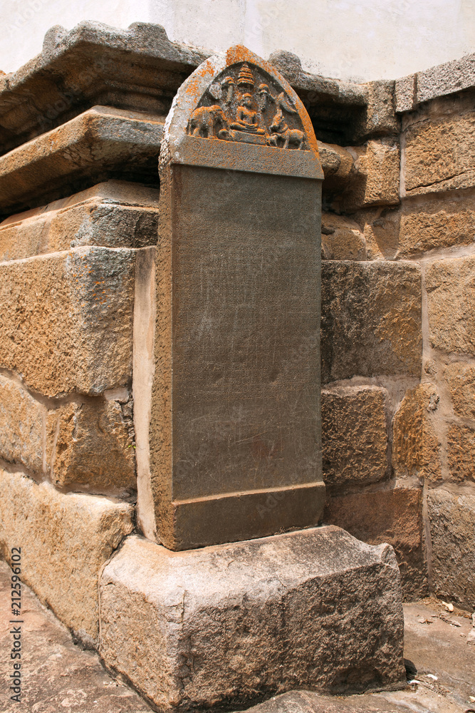 Carved inscriptions in Kannada on the stone pillar, Eradukatte Basadi ...