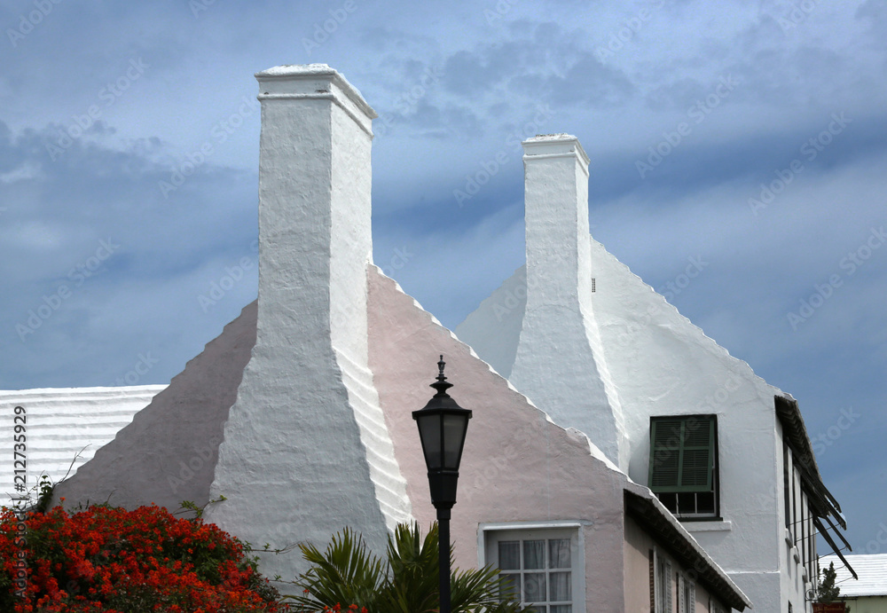 Foto de Classical Bermuda architecture with gable end chimneys and ...