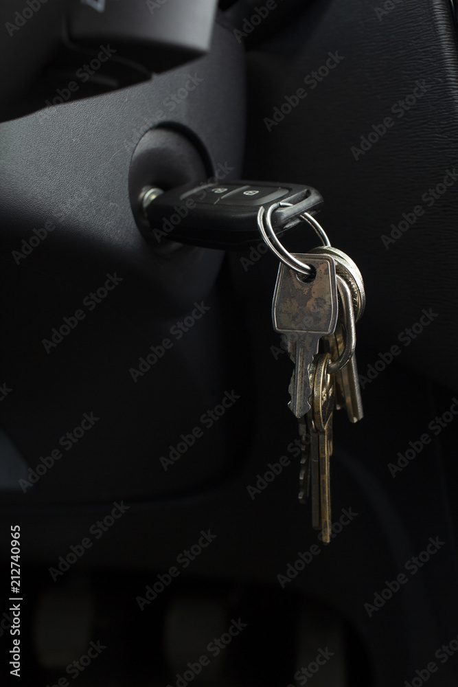 car keys in the ignition. car keys. a bunch of keys. starting the car ...