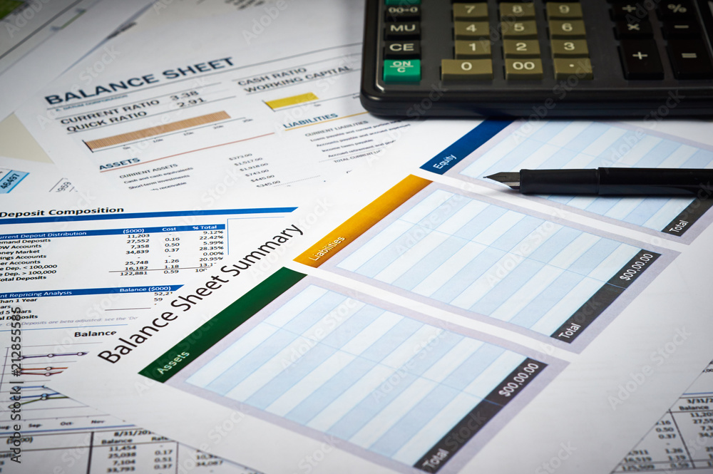 balance sheet summary and balance sheets with calculator and pen Stock ...