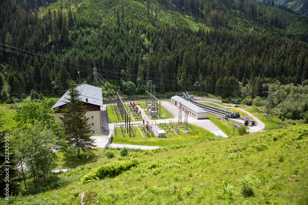 Valley power plant distributing electricity generated by the reservoir ...