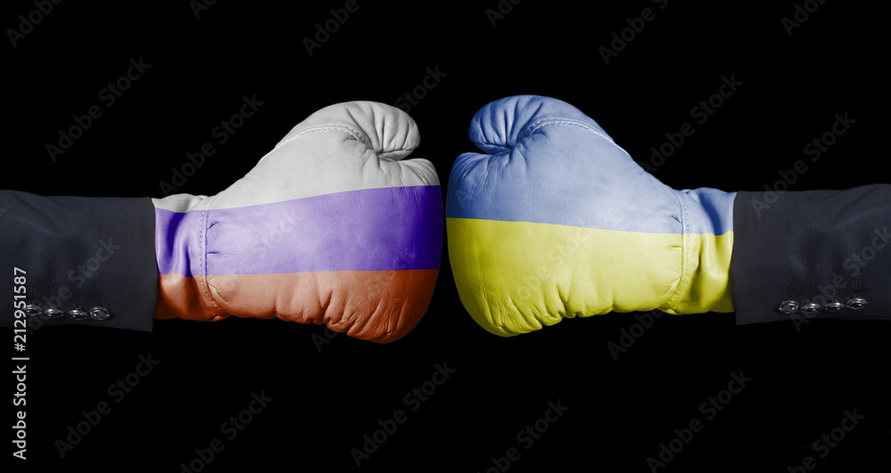 Boxing gloves with Russian and Ukrainian flag. Russia versus Ukraine ...