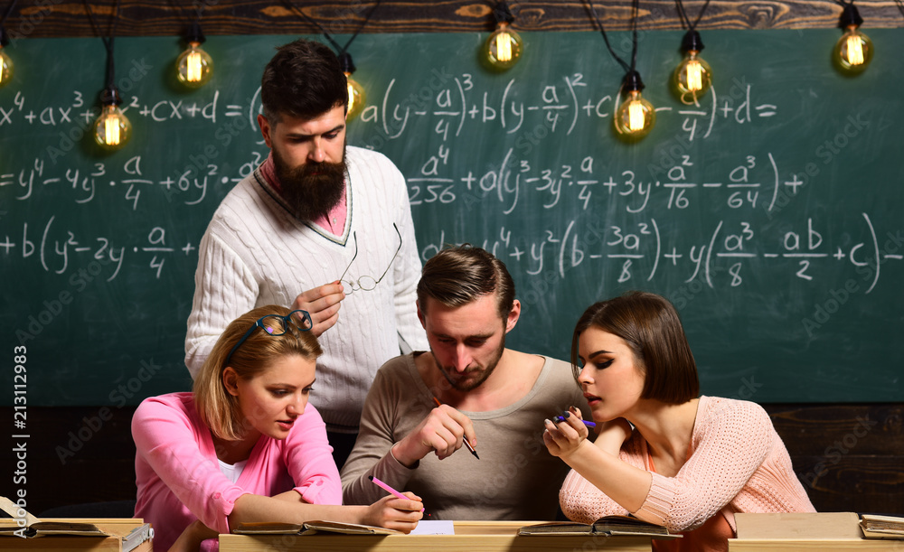 teamwork. teamwork of students working together in school classroom ...