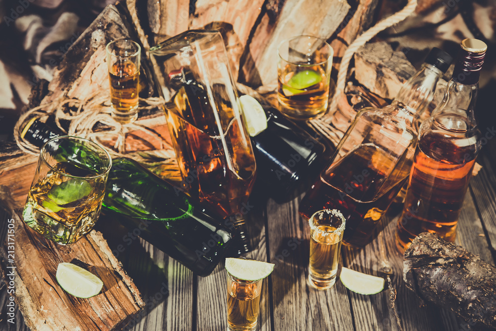 Alcohol in an old bar on a pirate ship with vintage rum and whiskey ...