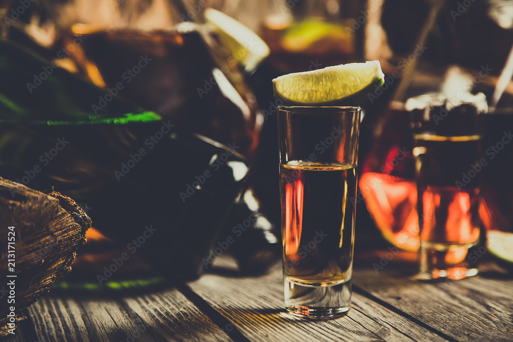 Alcohol in an old bar on a pirate ship with vintage rum and whiskey ...