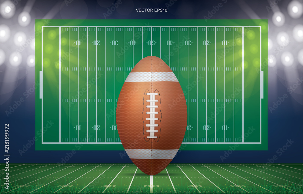 Football ball on football field stadium background. With perspective ...