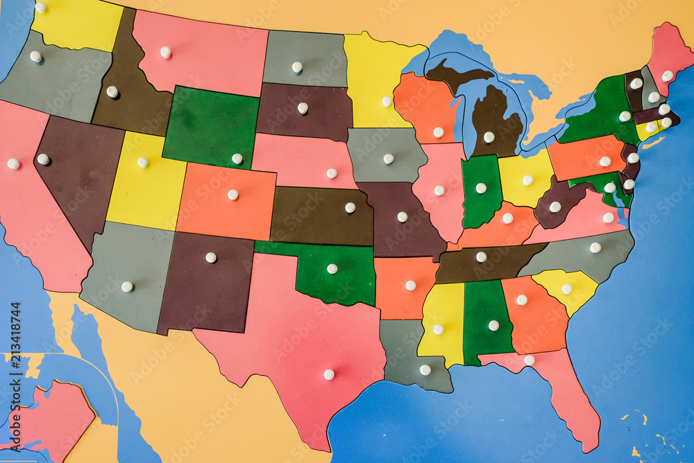 Puzzle with map of the states of the United States of America in a ...