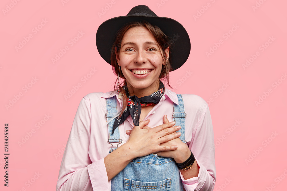 Positive friendly looking female with European appearance being ...