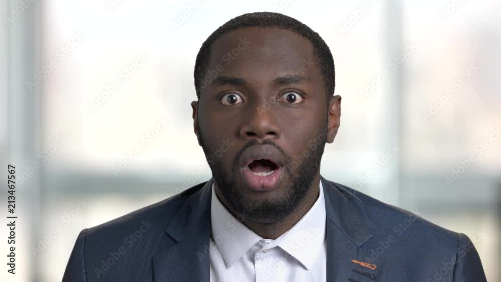 Portrait of shocked afro american business man. Surprised and shocked ...