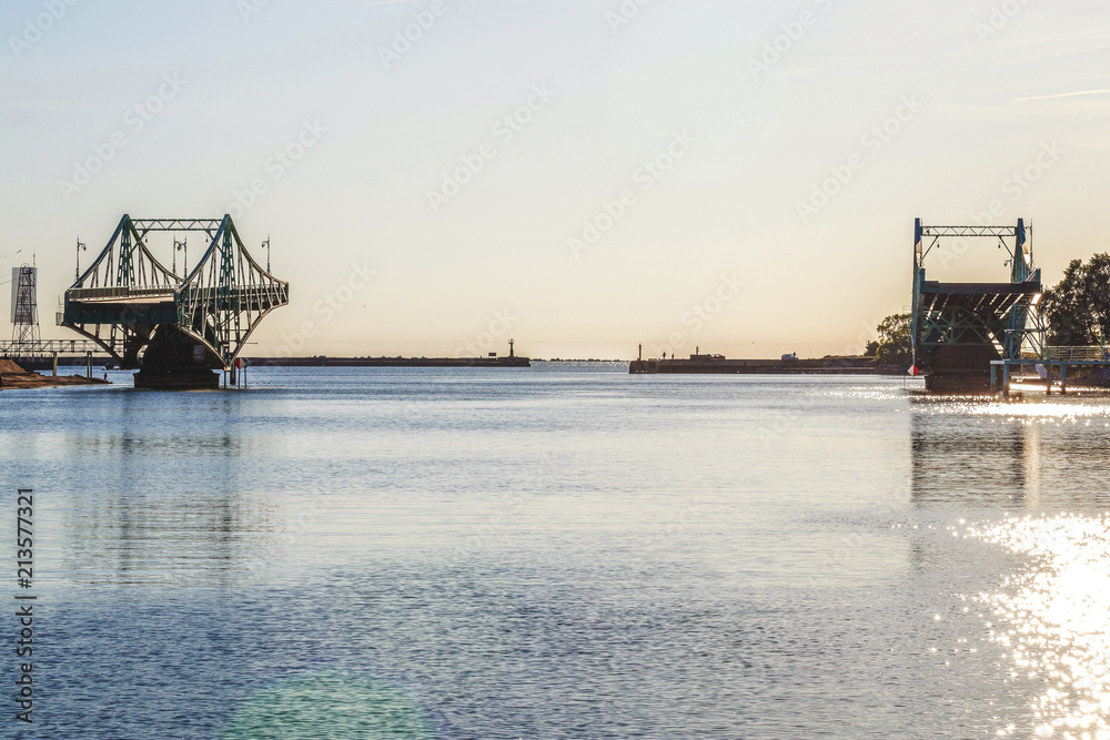 coasts are connected by an old cut-off bridge Stock Photo | Adobe Stock