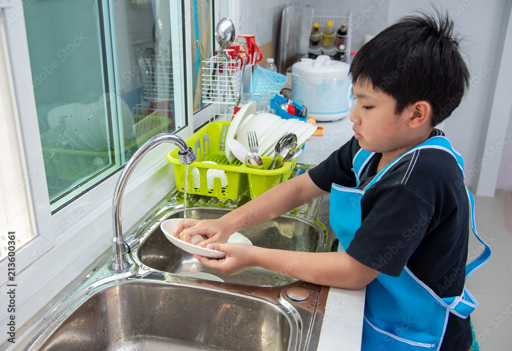 Boy Washing Dishes