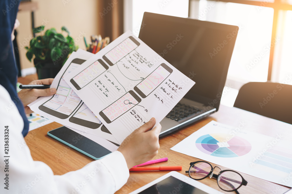 Artist creative designer hands sketching of screens for mobile ...