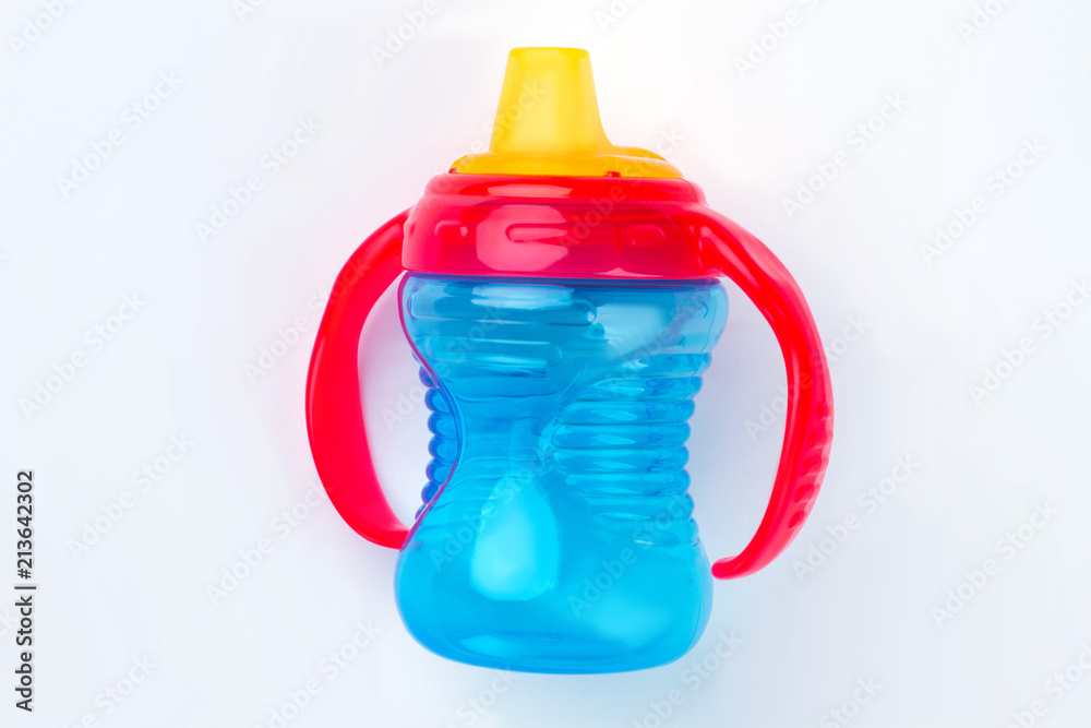Blue baby plastic bottle. Stock Photo | Adobe Stock