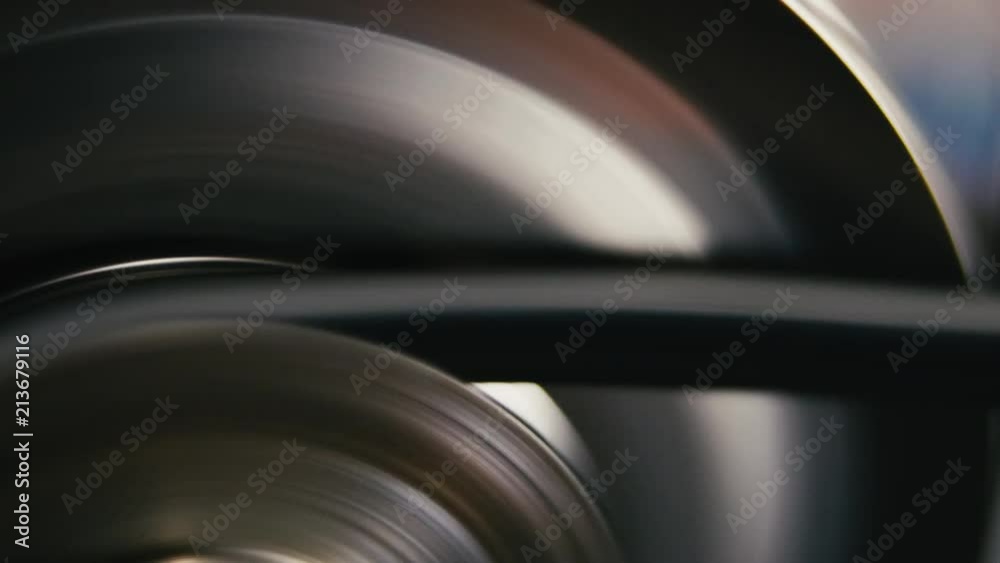 Movement Of Metal Wheel and Belt In A Mechanical Device. Gearbox Stock ...