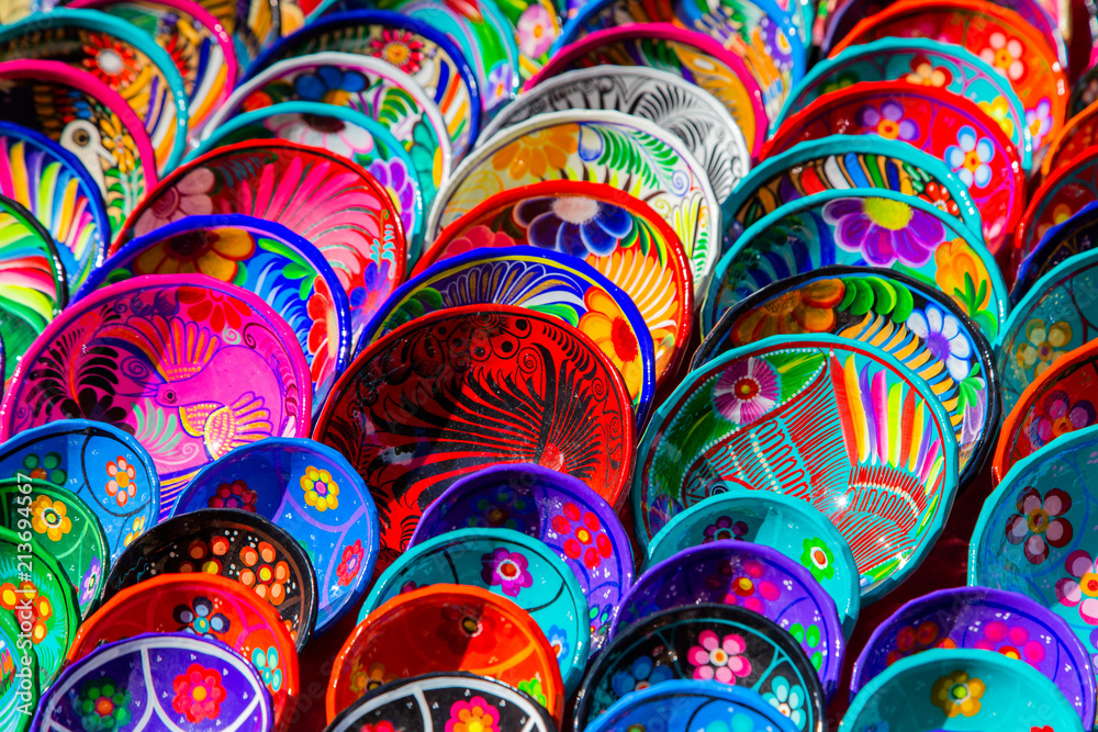 Plates in the traditional Mexican style. Souvenirs from Chichen Itza ...