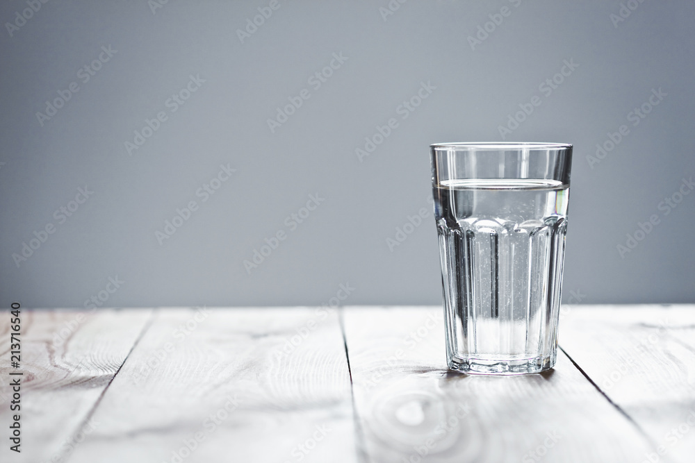 Glass of pure water on neutral background with copy space Stock Photo ...