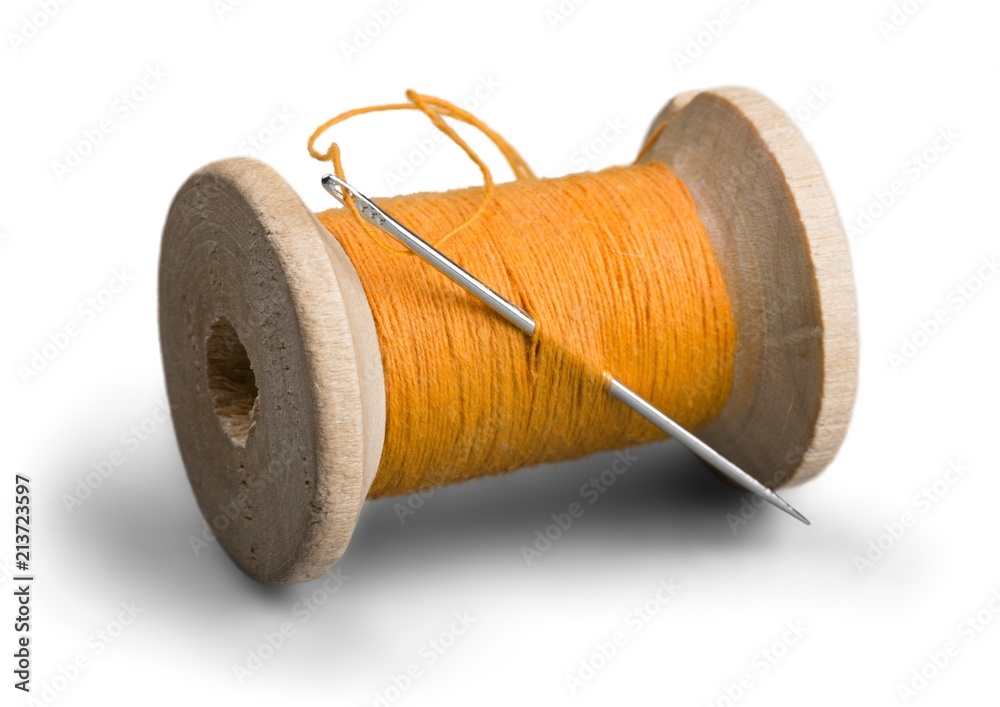 Spool of Thread and Needle Stock Photo | Adobe Stock