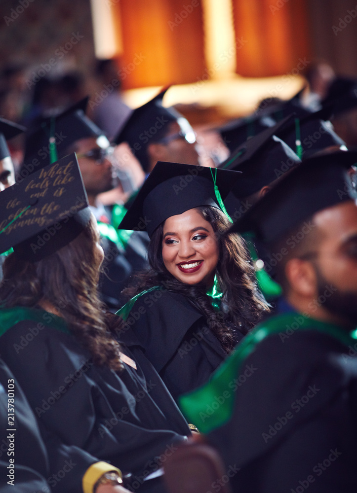 grroup of happy graduate students in gowns on graduation ceremony Stock ...