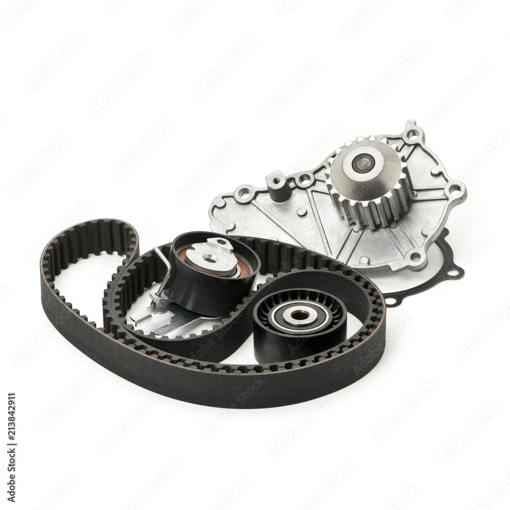 Timing belt kit with rollers and water pump isolated on white ...