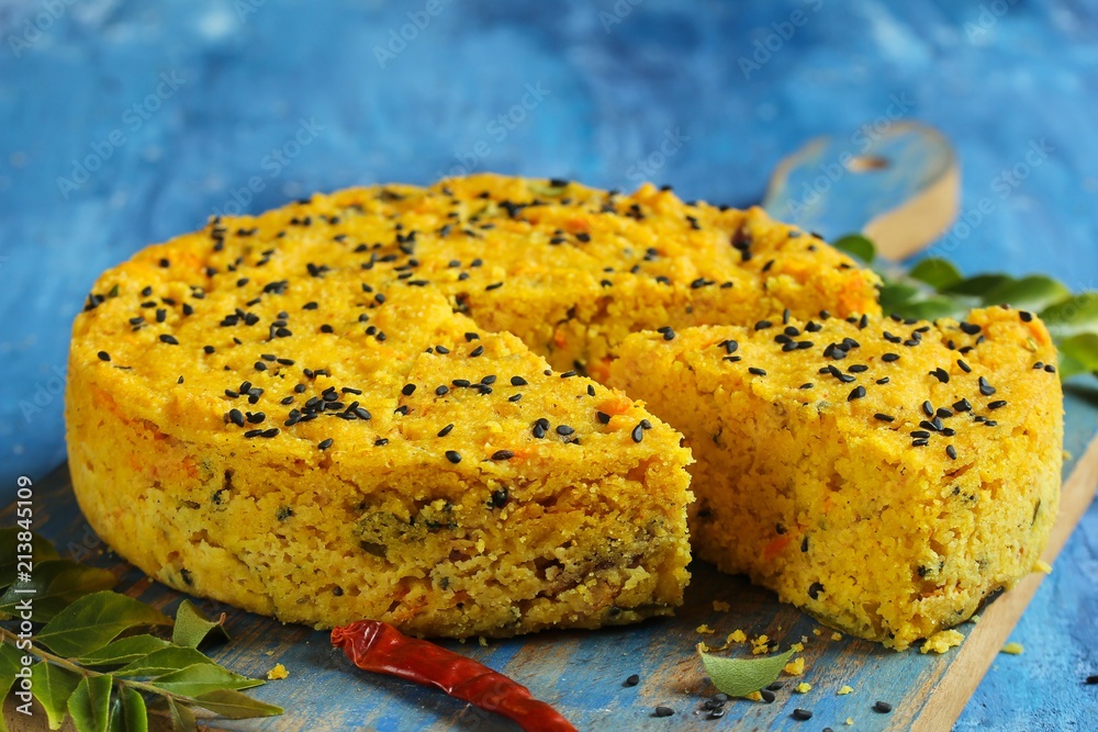 Handwa or Handvo - Gujarati snack cake, selective focus Stock Photo ...