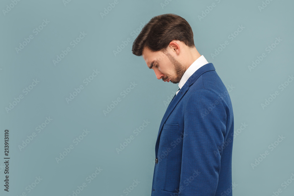 side view or profile view of sad, unhappy crying handsome bearded ...