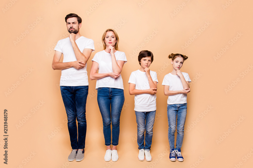 Full length portrait of beautiful family bieng confused, bearded father ...
