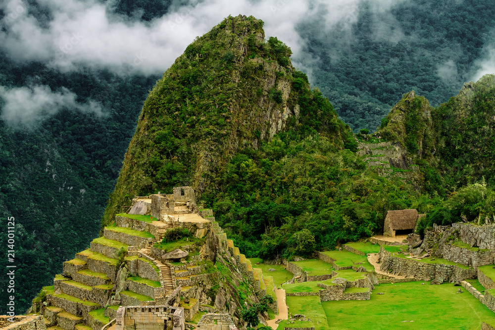 Intihuatana building (sacred place) of Machu Picchu with Uña Picchu ...