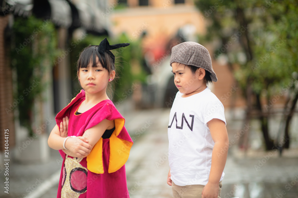 boy and girl are in argument on each other, screaming and shouting with ...