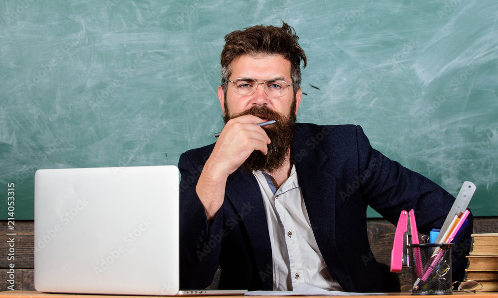 Fotka „Pay attention to details. Teacher concentrated bearded mature ... Fotka „Pay attention to details. Teacher concentrated bearded mature ...