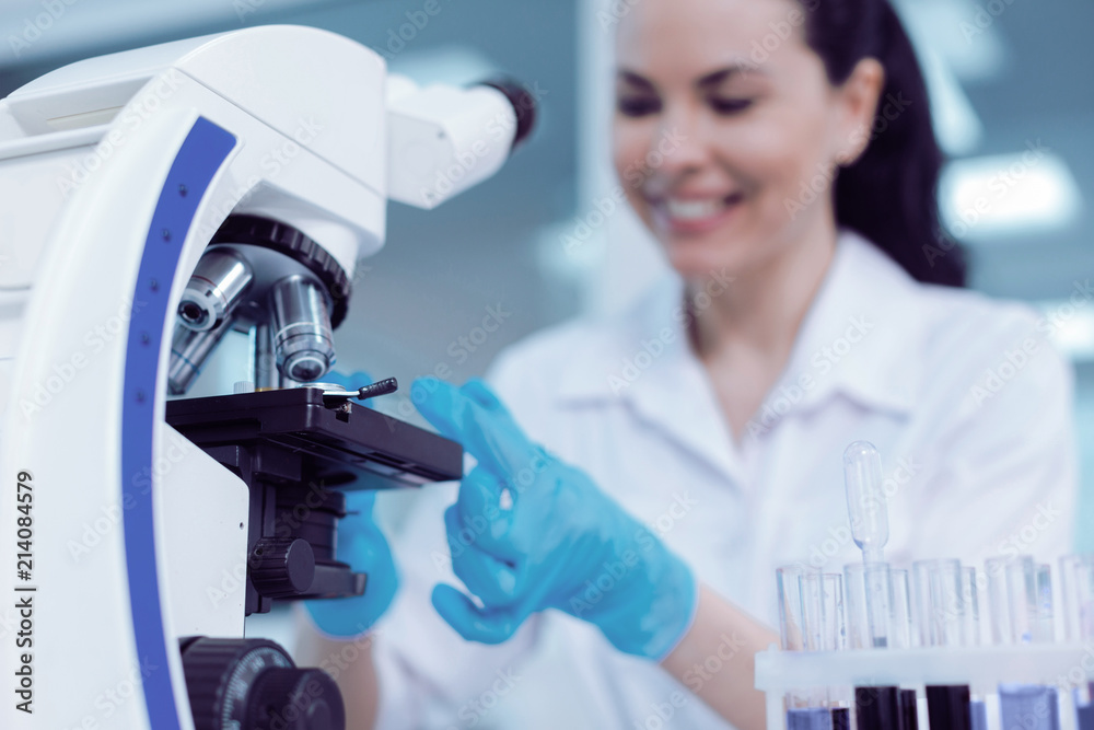 Modern equipment. Selective focus of a professional microscope with a ...