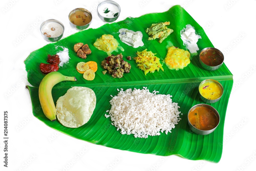 Traditional Onam Feast or Onasadya served in Banana leaf isolated on ...